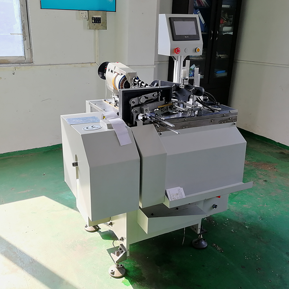 Hang Tag Stringer | Universal Machinery